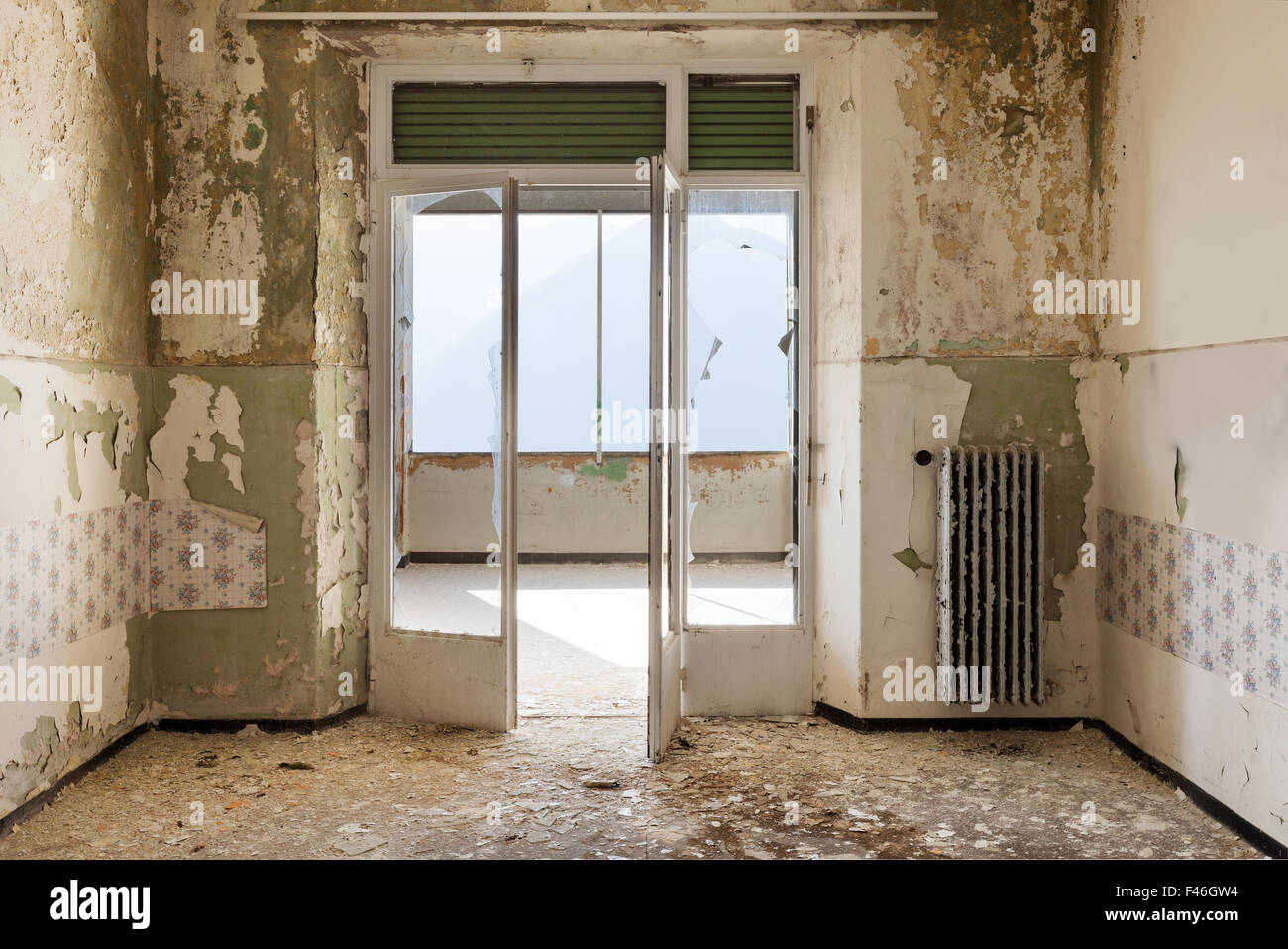 old destroyed building, large room with window Stock Photo - Alamy