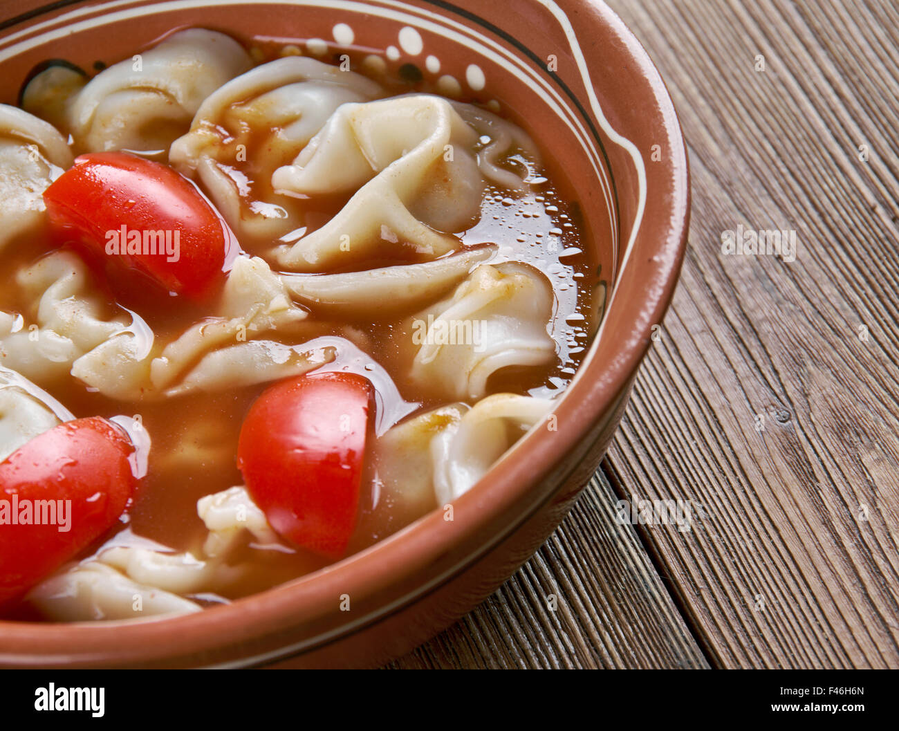 Chuchvara - very small dumpling typical of Uzbek cuisin Stock Photo - Alamy