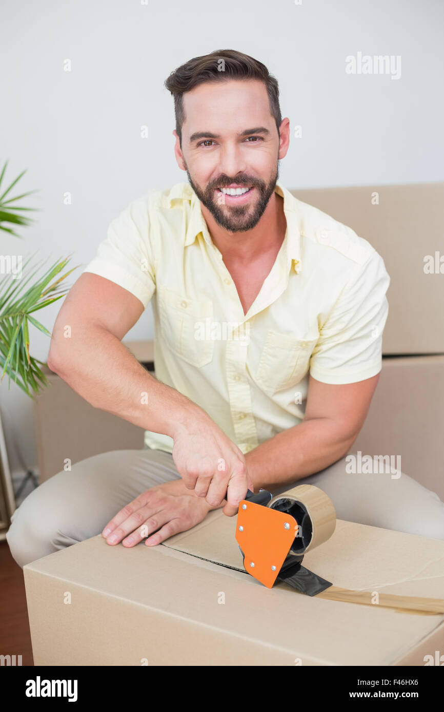 Handsome man packing box hi-res stock photography and images - Alamy