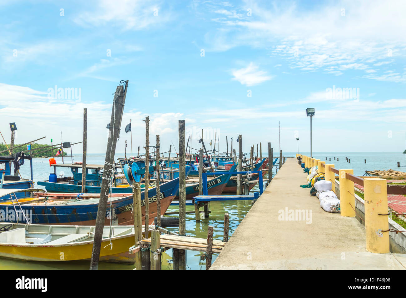 MUAR, JOHORE - 24 NOVEMBER 2013 : Boats park at Pantai Leka Jetty ...