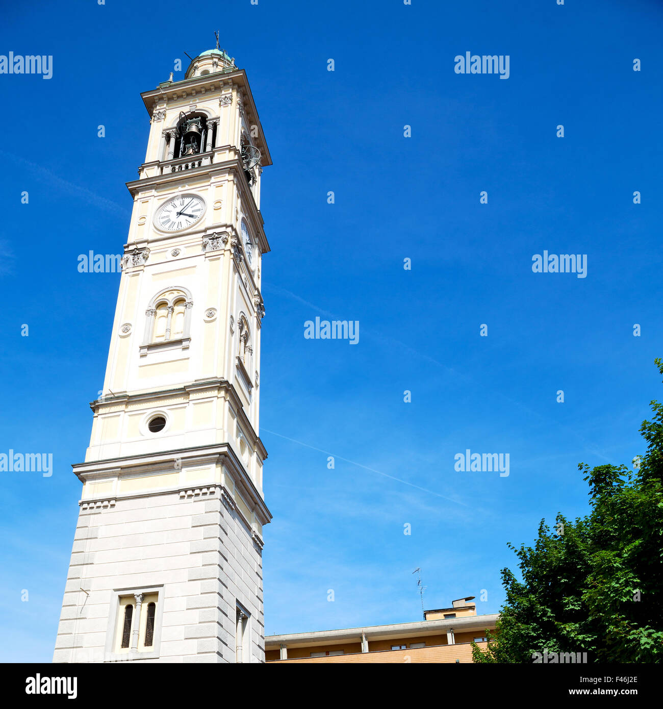 ancien clock tower in italy europe old stone and bell Stock Photo - Alamy