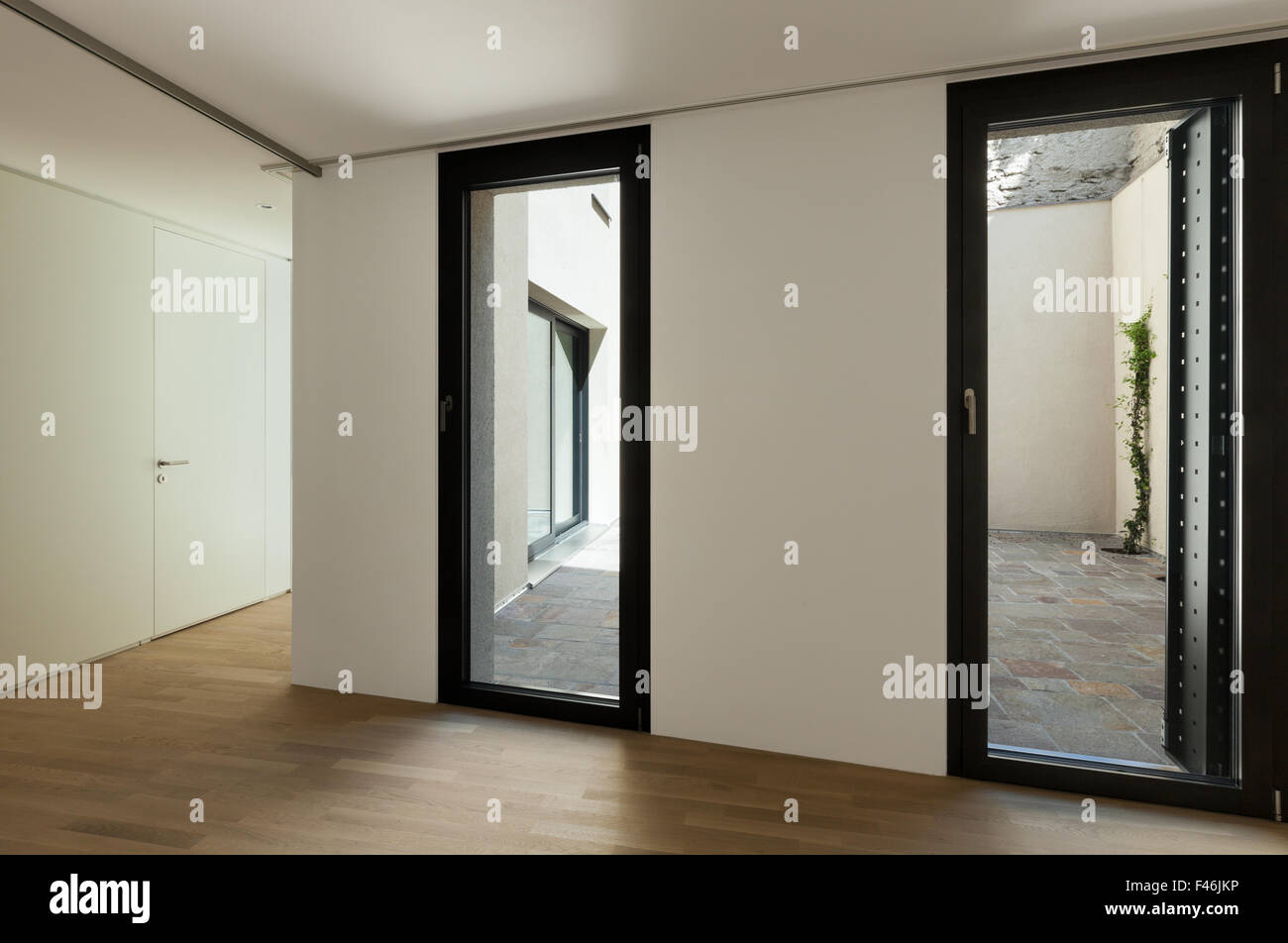 Interior new house, view veranda from passage Stock Photo - Alamy