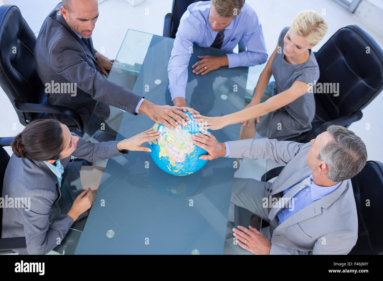 Woman touching worldwide business hi-res stock photography and images ...
