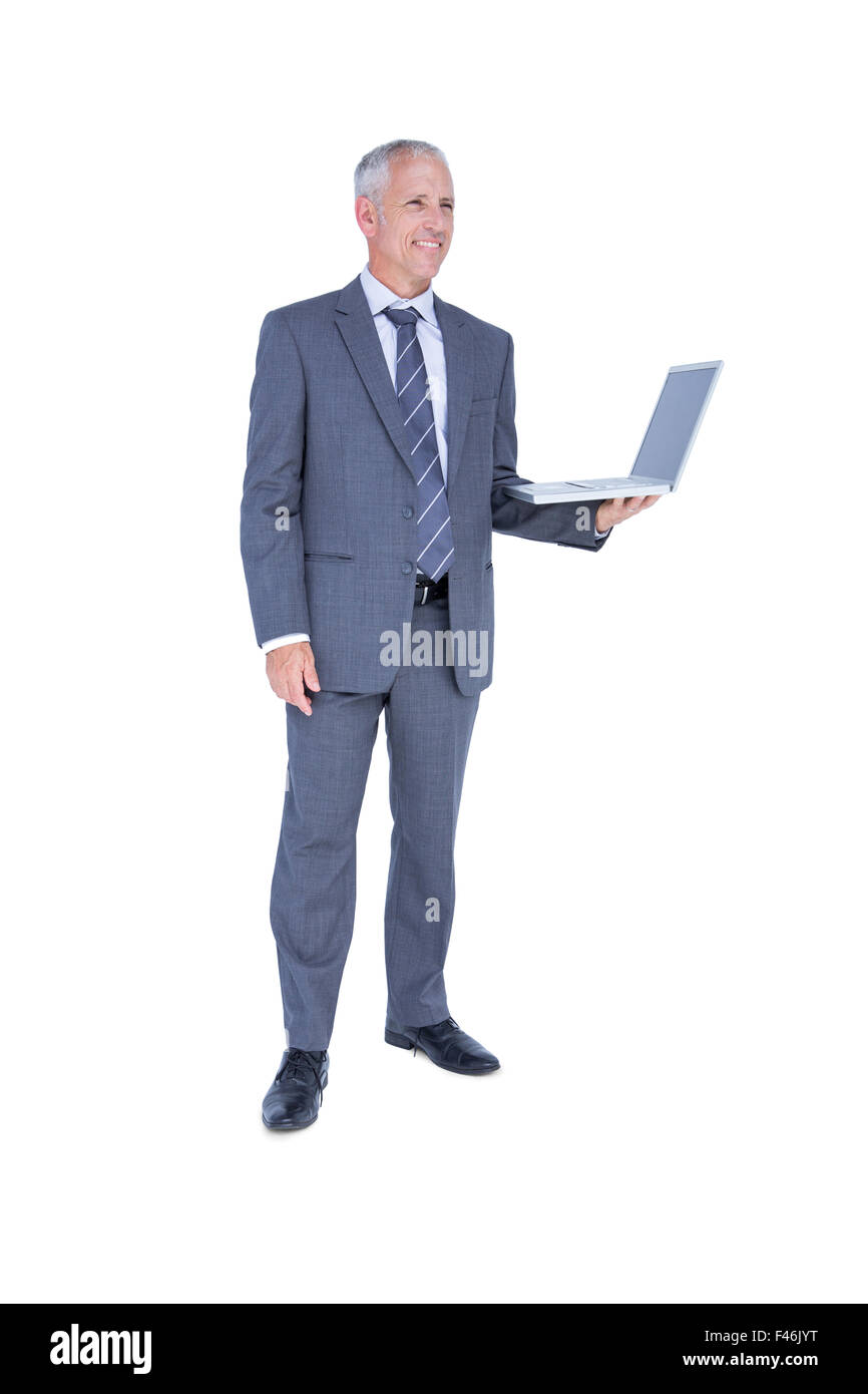 Happy businessman holding laptop hi-res stock photography and images ...