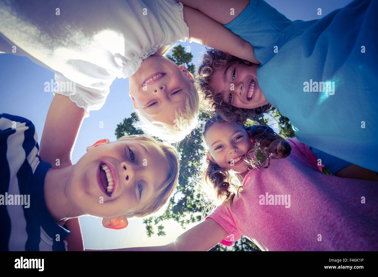 Children looking down and smiling hi-res stock photography and images ...