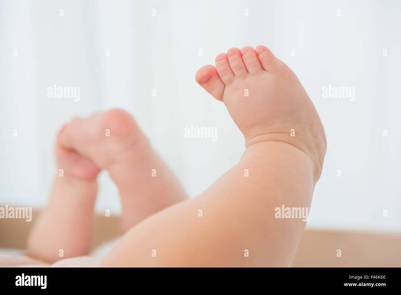 Beautiful foot of baby Stock Photo - Alamy