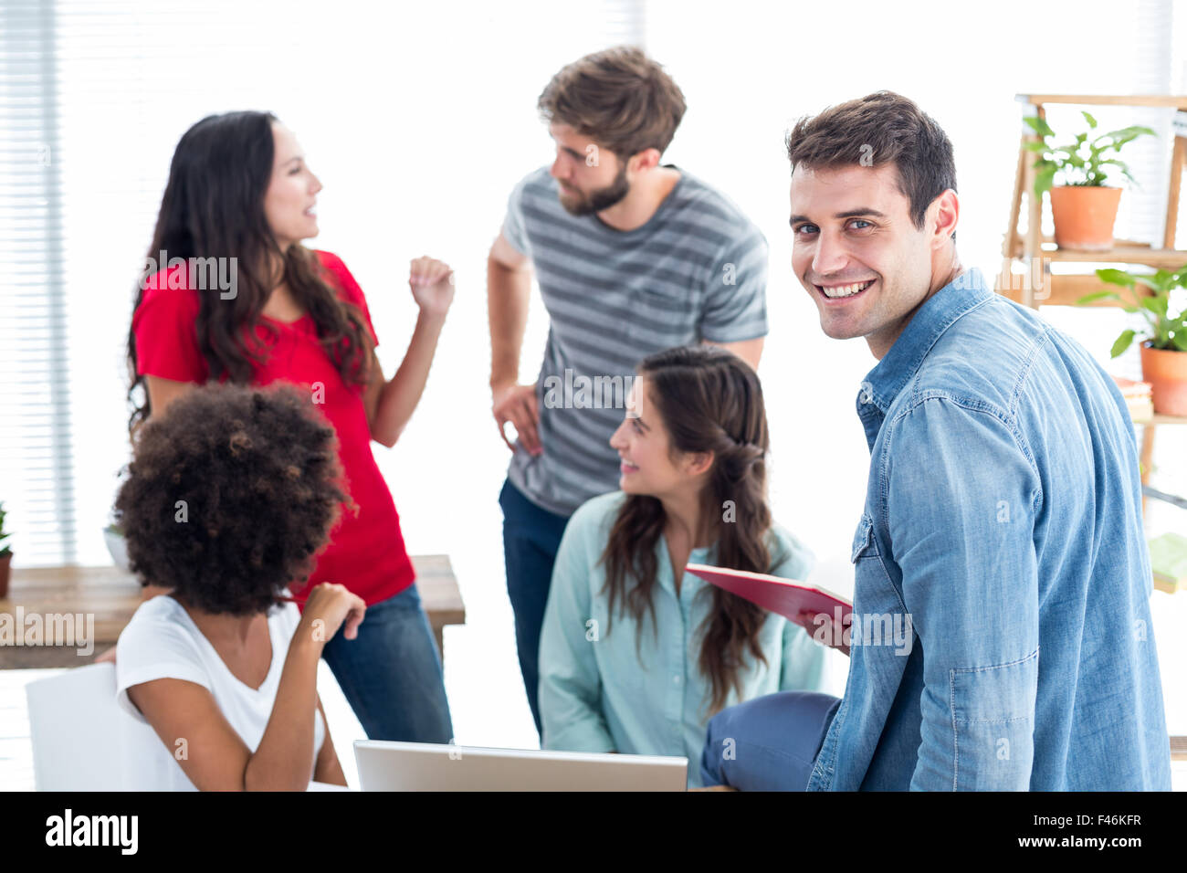 Happy group executives discussing hi-res stock photography and images ...