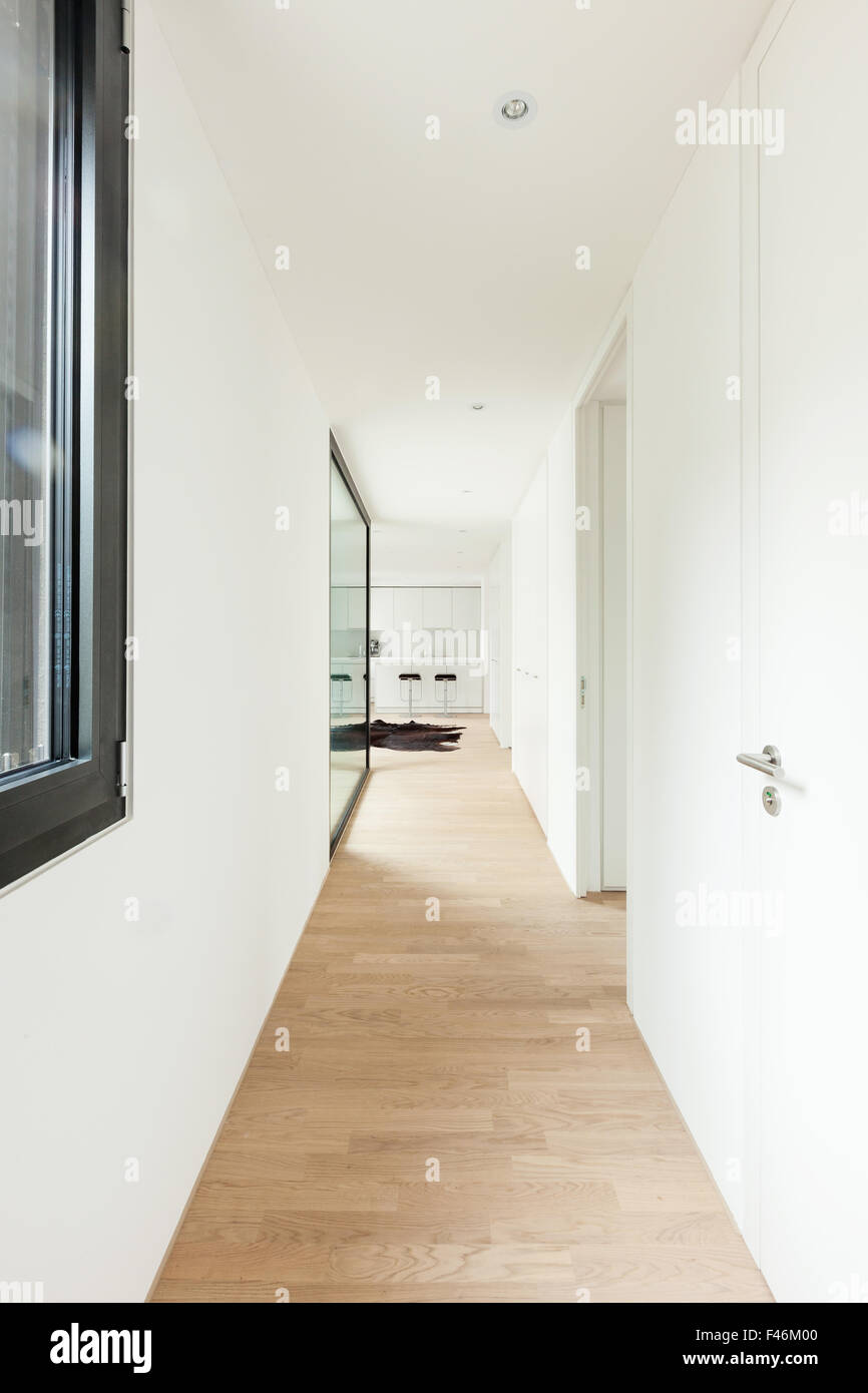 Interior new house, view kitchen from corridor Stock Photo - Alamy