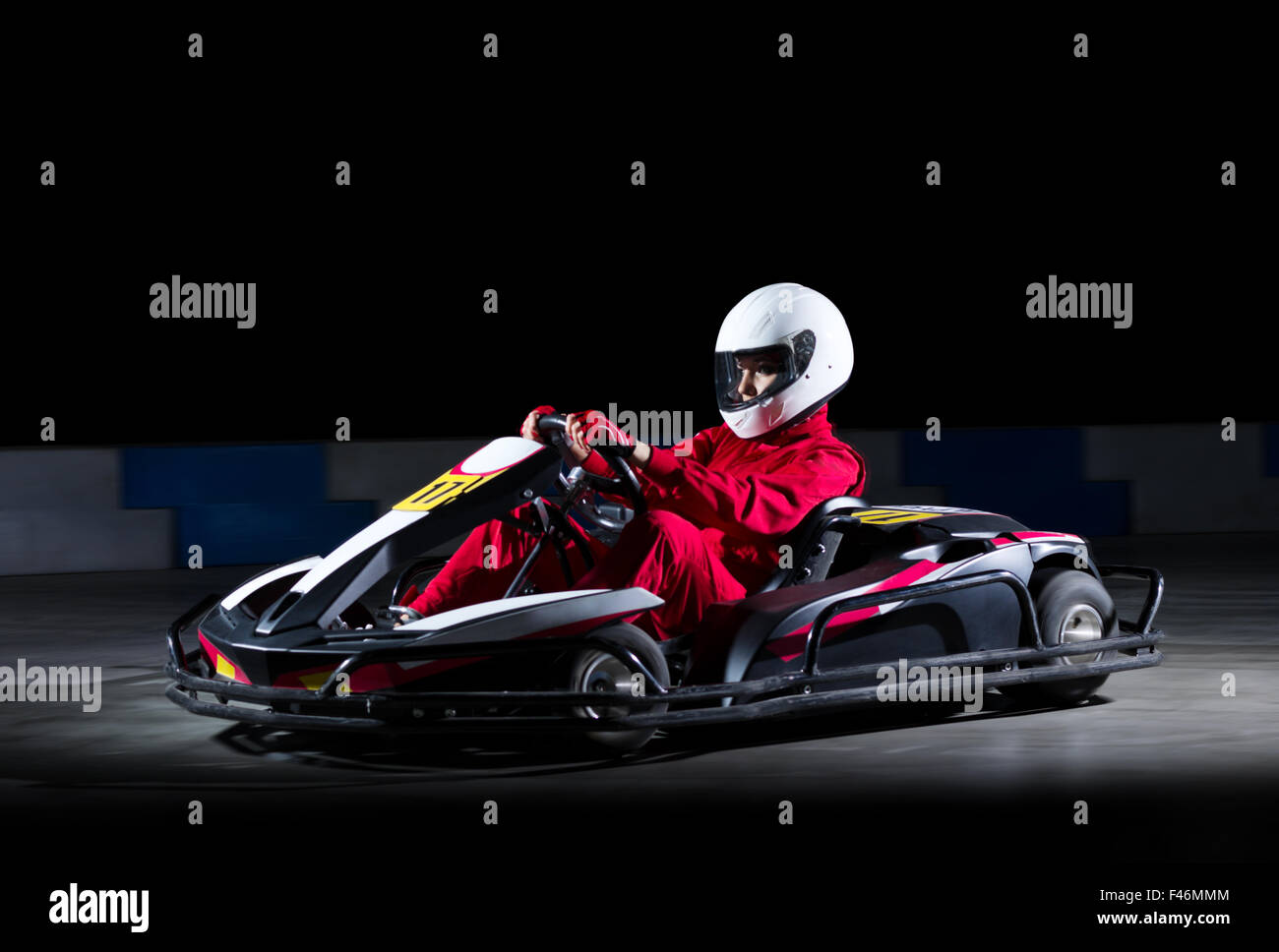 Young girl karting racer isolated Stock Photo - Alamy