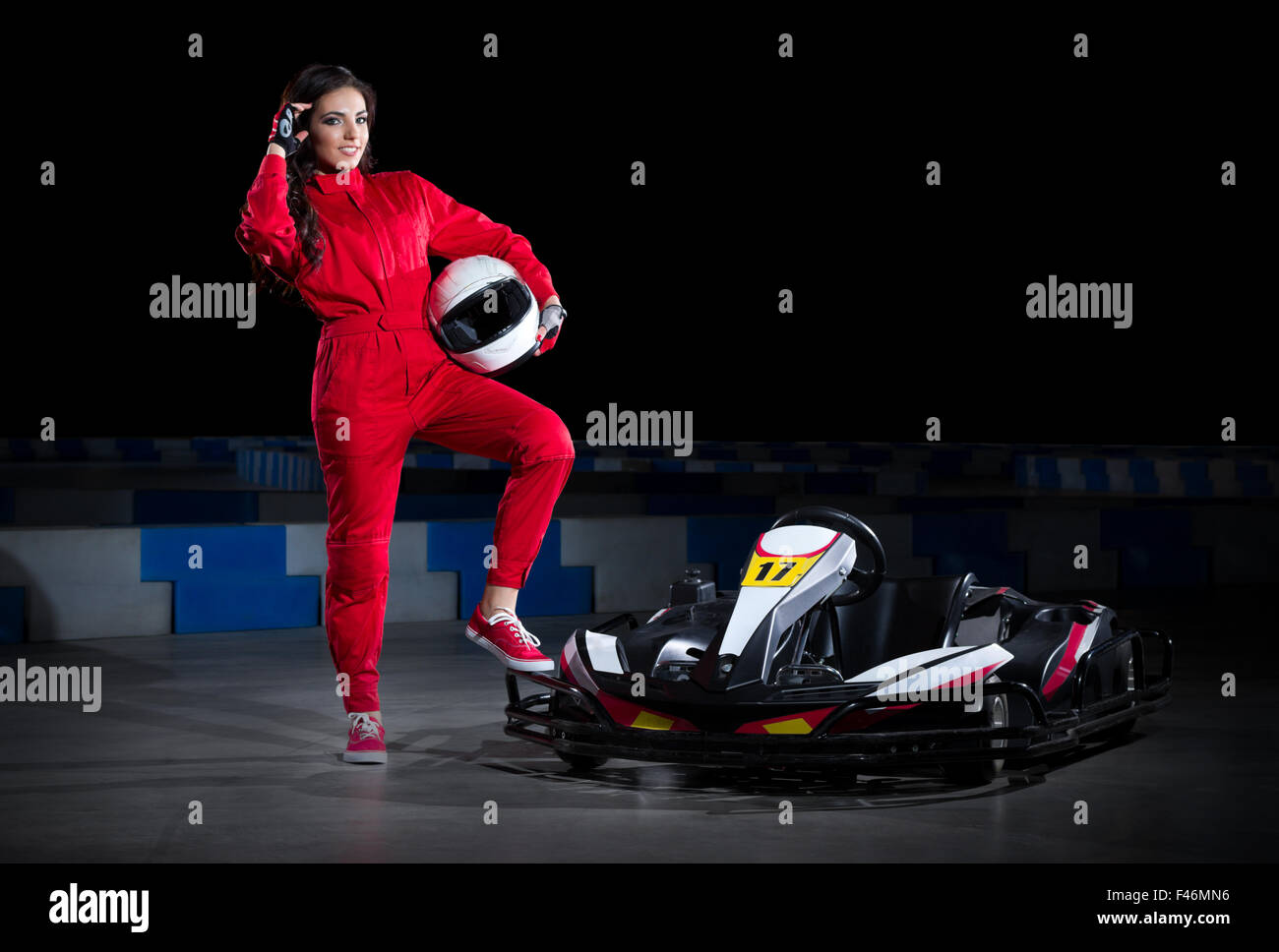 Young girl karting racer isolated Stock Photo - Alamy