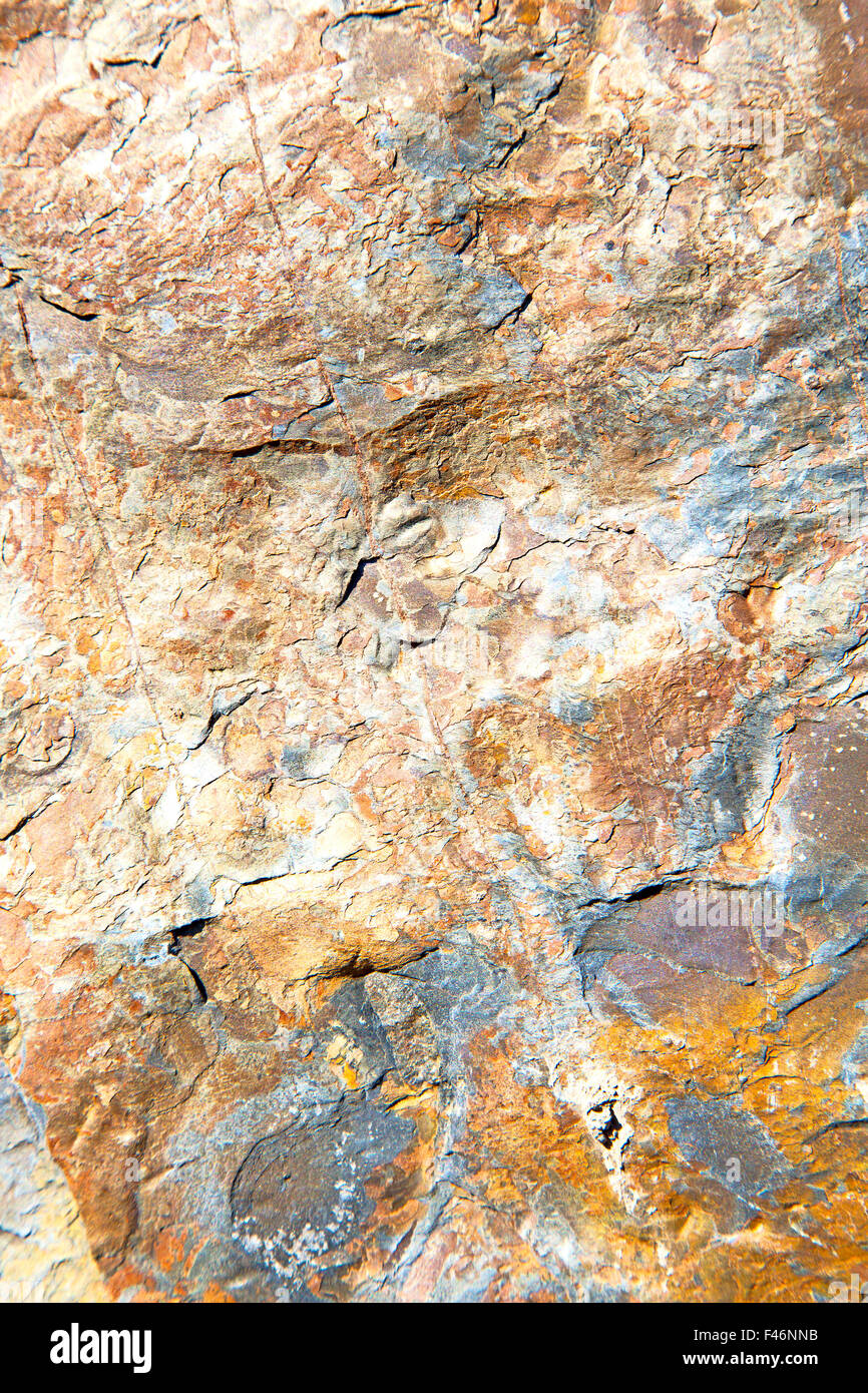 rocks stone and red orange gneiss in the wall of morocco Stock Photo ...
