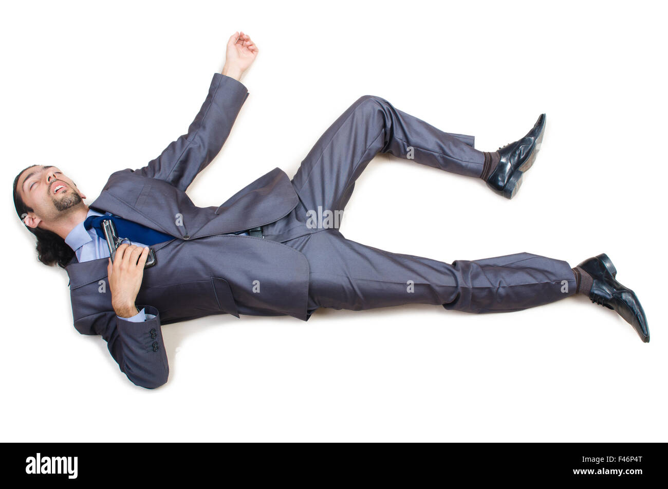 Businessman on the floor isolated on white Stock Photo - Alamy