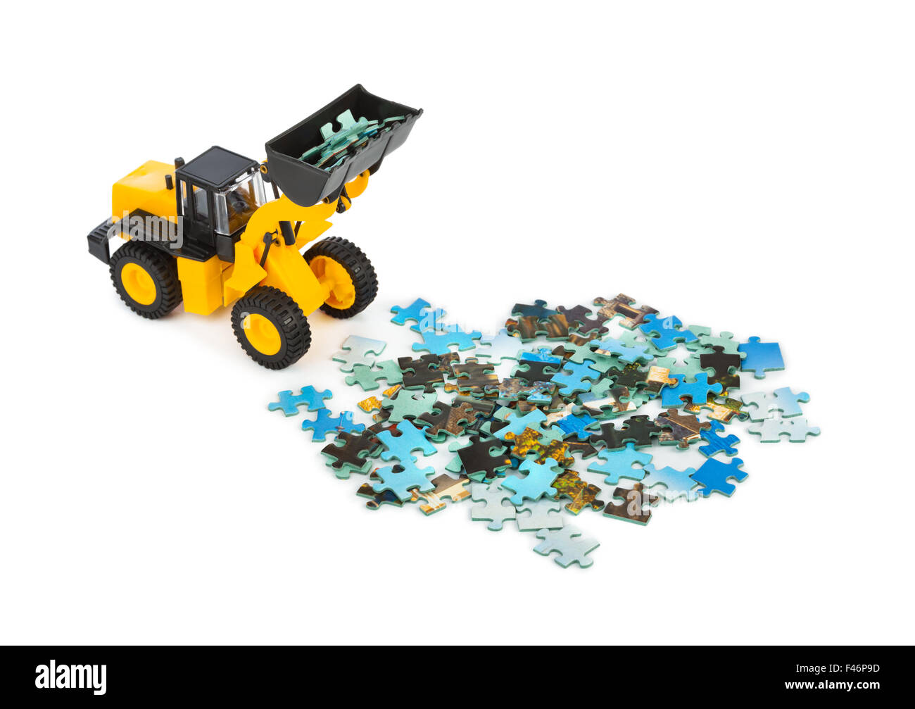 Toy loader and puzzle Stock Photo - Alamy