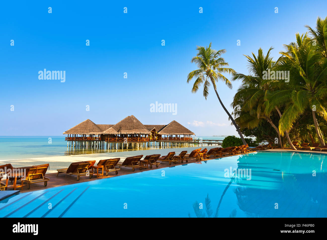 Pool on tropical Maldives island Stock Photo - Alamy