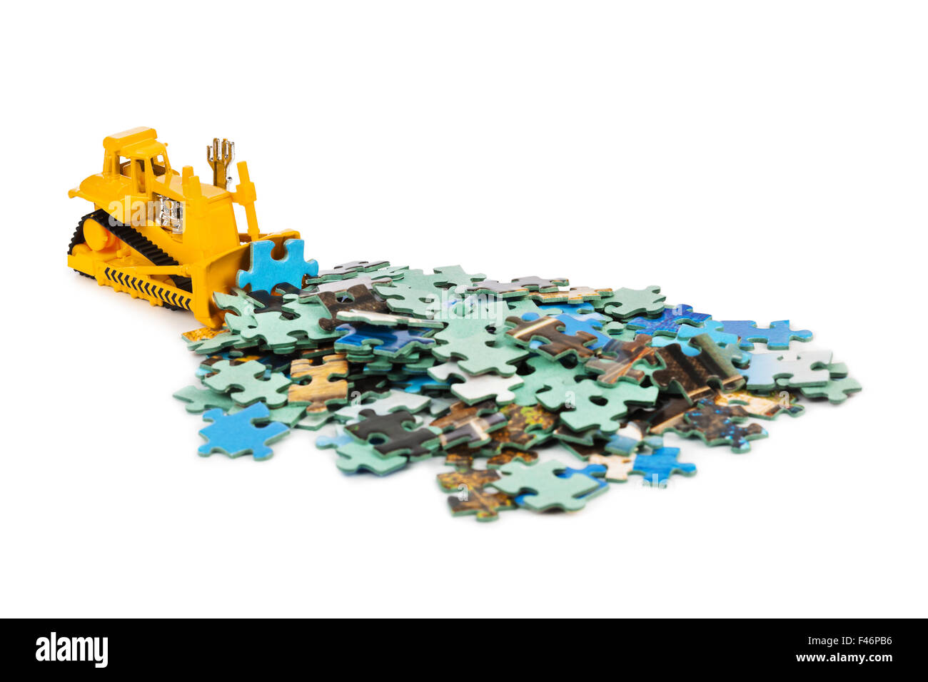 Toy bulldozer and puzzle Stock Photo - Alamy