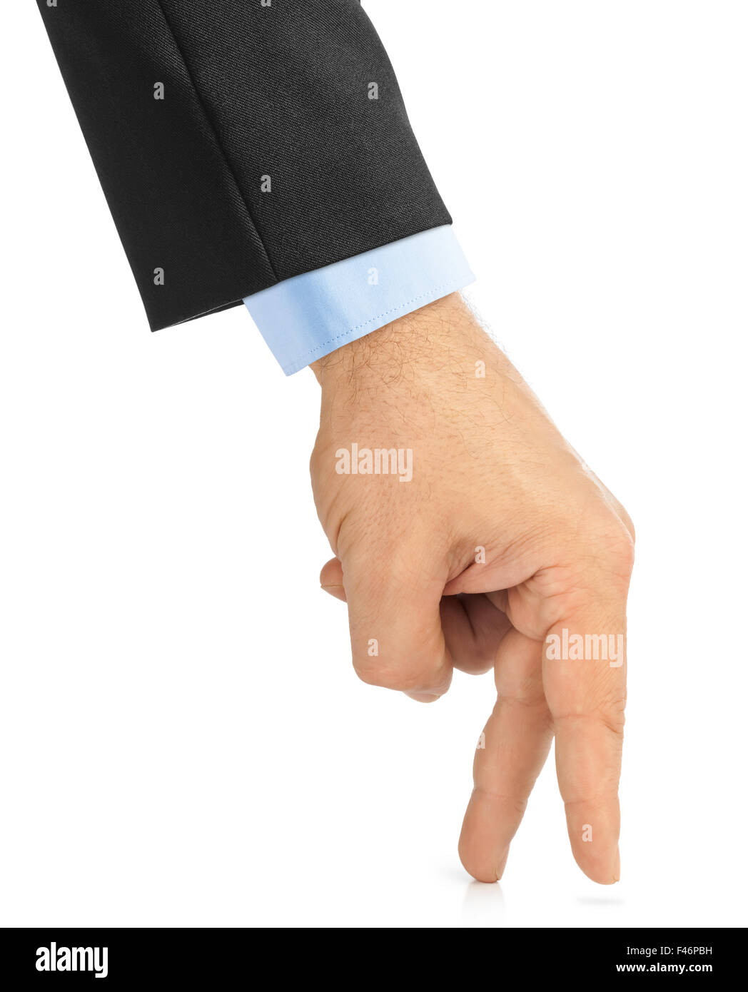 Small man made of fingers hand Stock Photo - Alamy