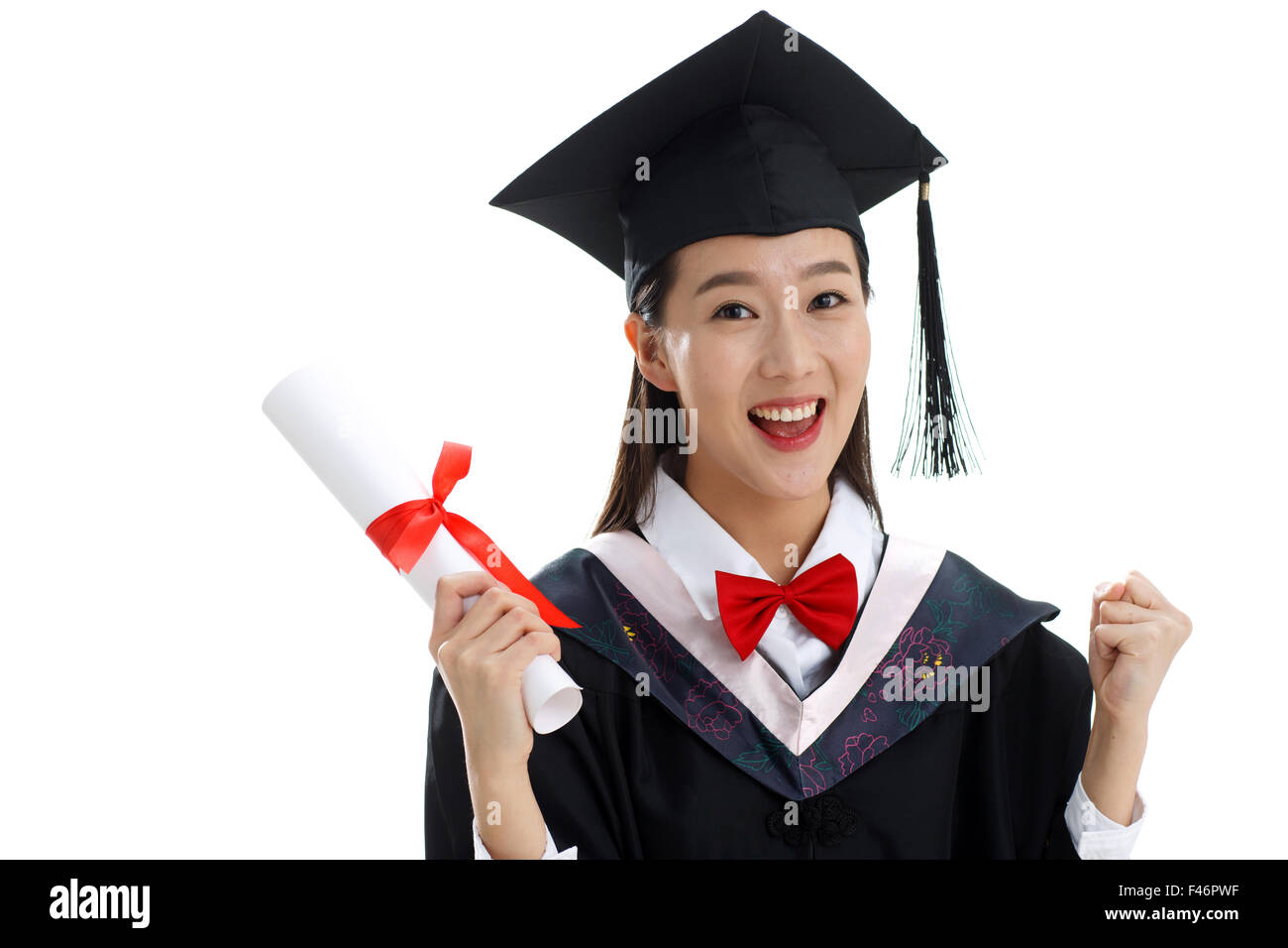 Smiling graduate holding diploma Stock Photo - Alamy