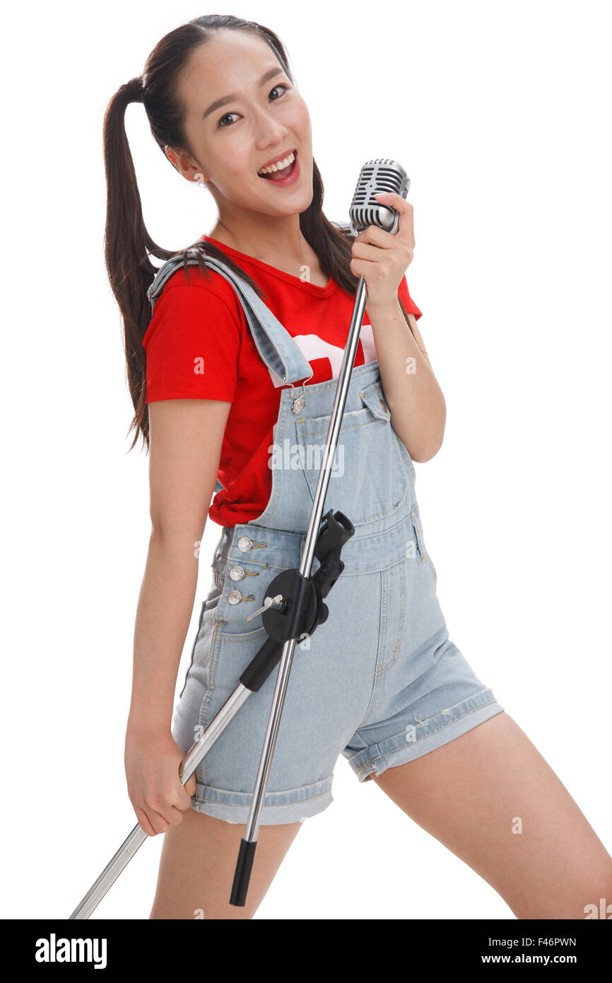 Happy young girl singing Stock Photo - Alamy