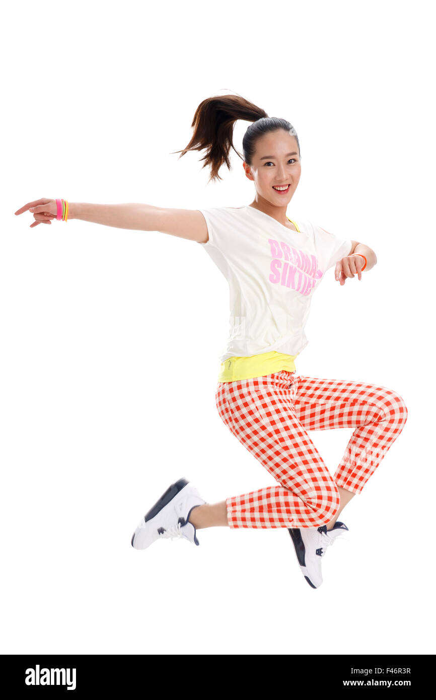 Young woman jumping Stock Photo - Alamy