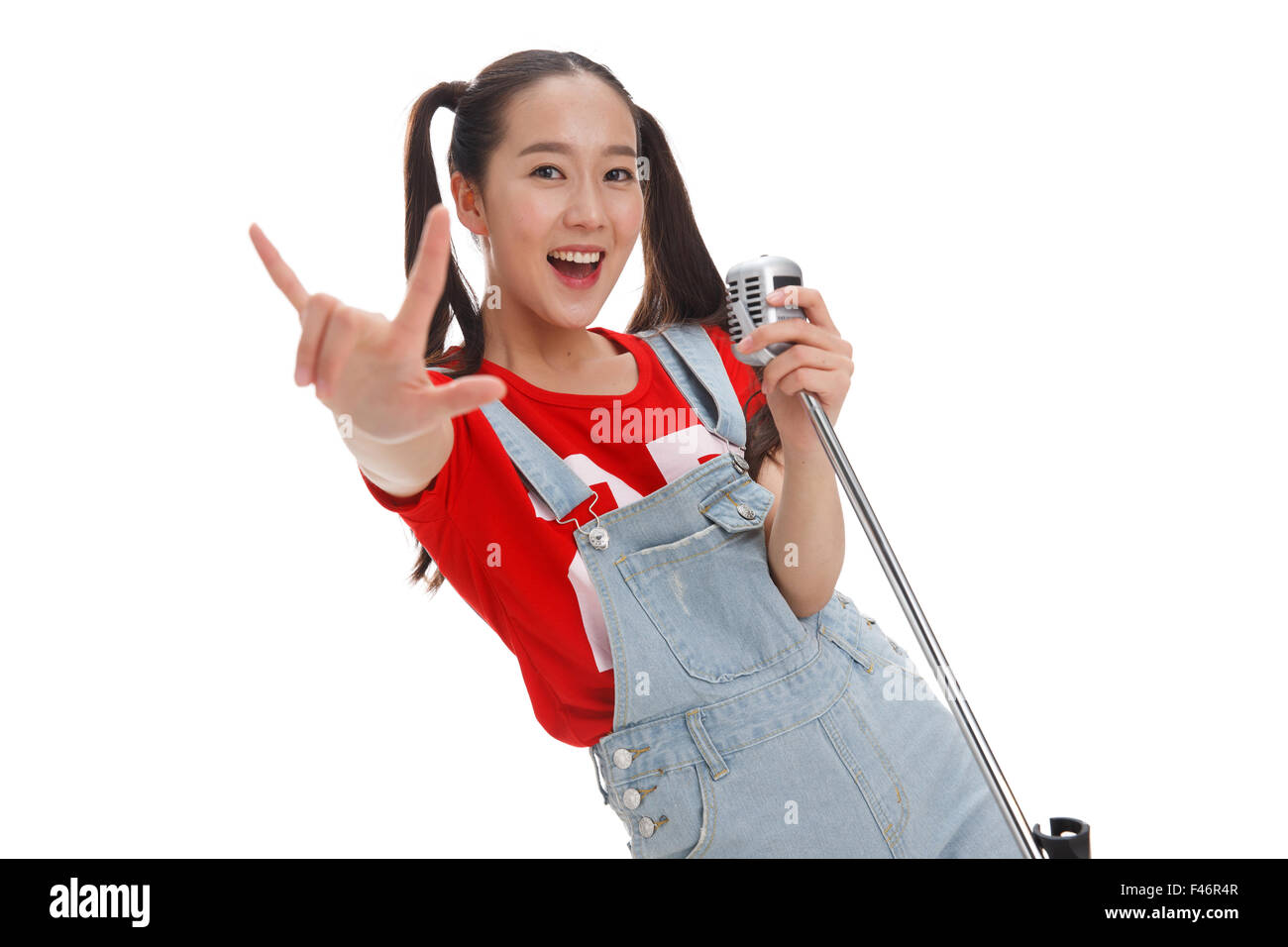 Young girl singing Stock Photo - Alamy