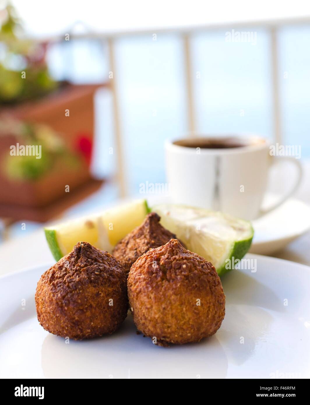 Three small pieces of kebbe, a lebanese dish with mince meat or ...