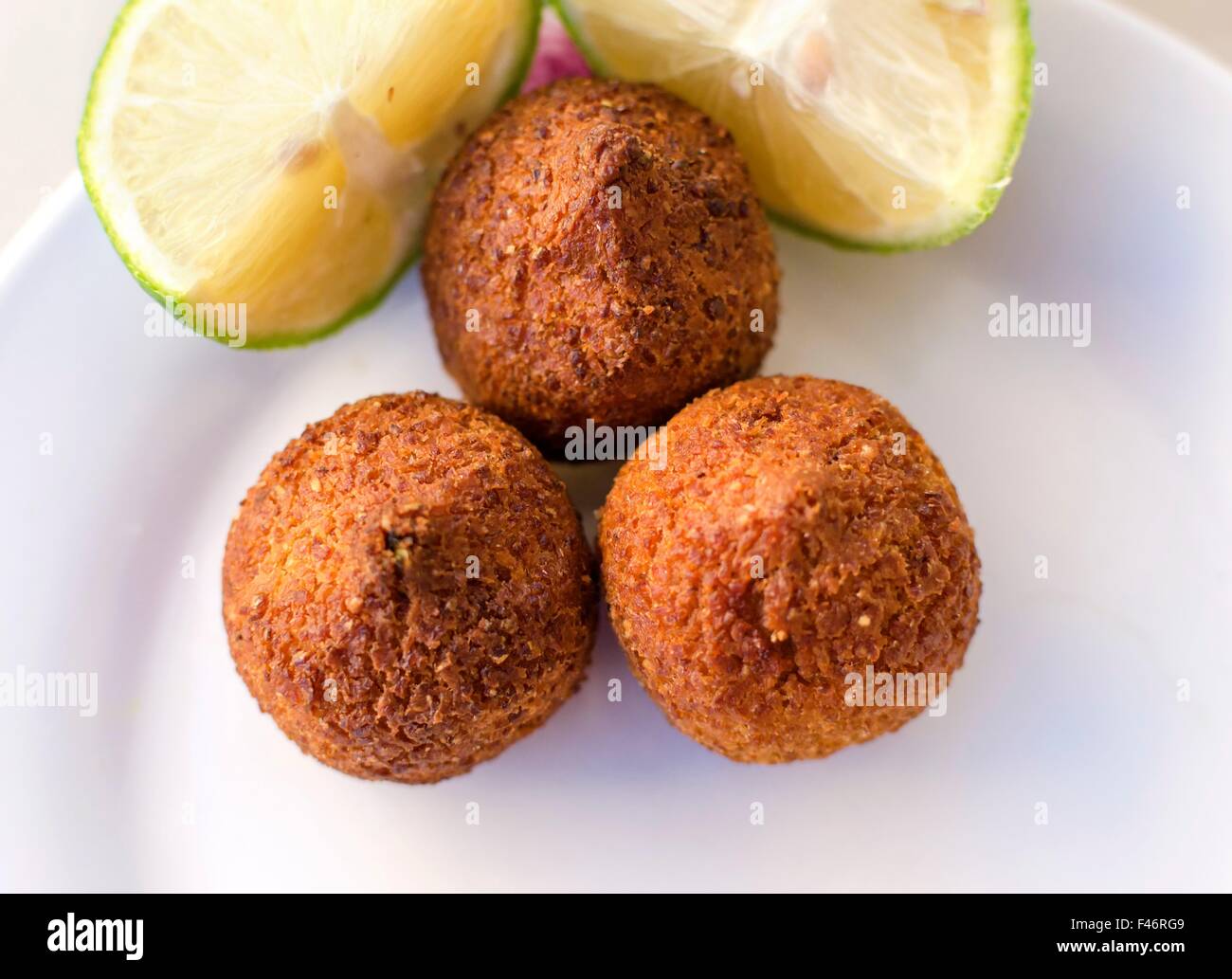 Three small pieces of kebbe, a lebanese dish with mince meat or ...