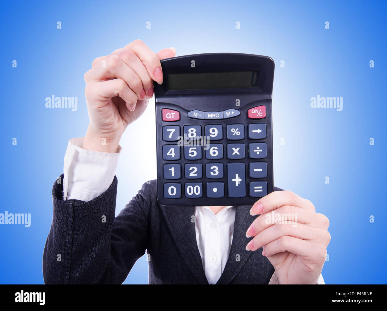 Nerd female accountant with calculator Stock Photo - Alamy