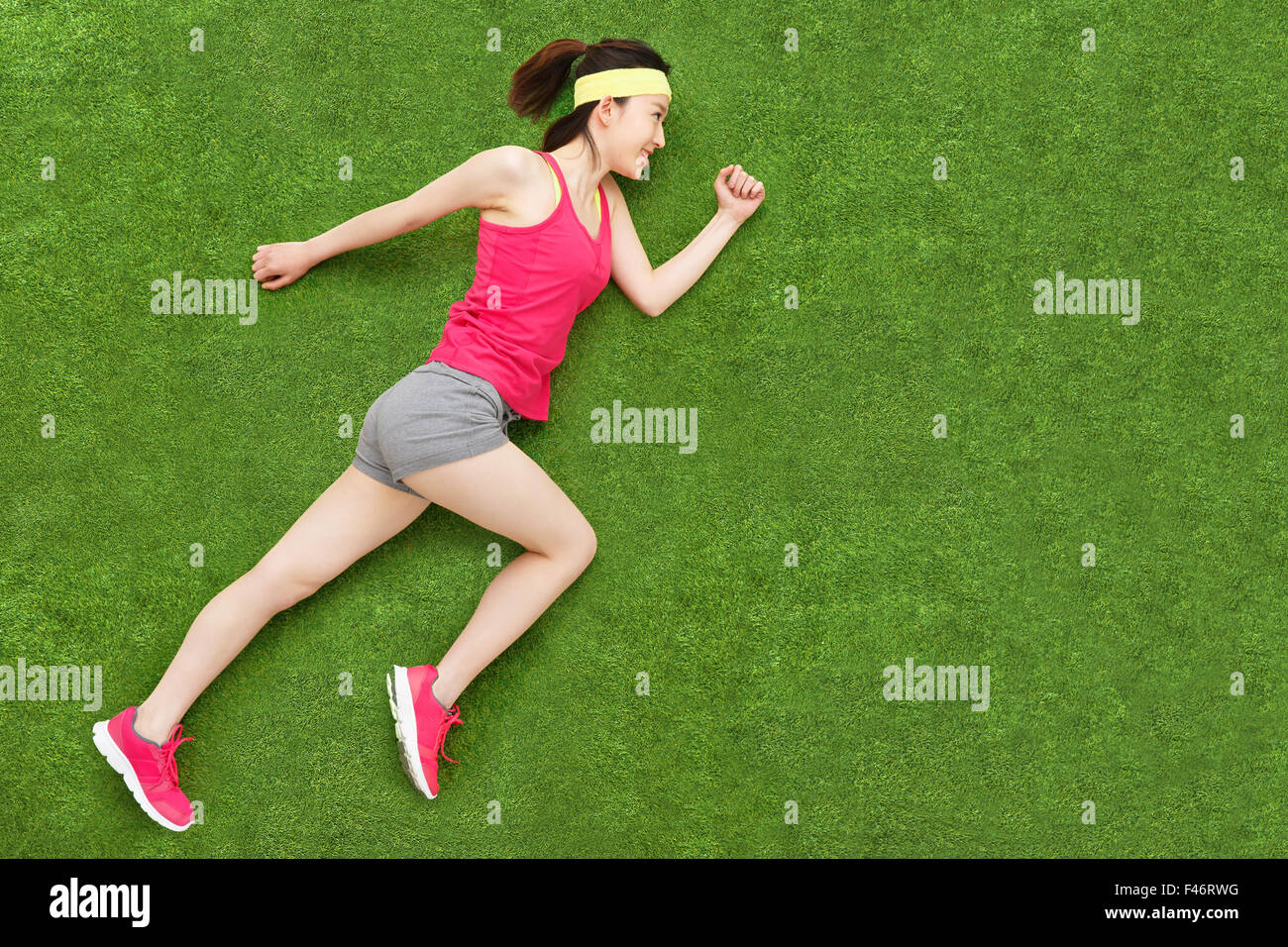 Adults running on grass hi-res stock photography and images - Alamy
