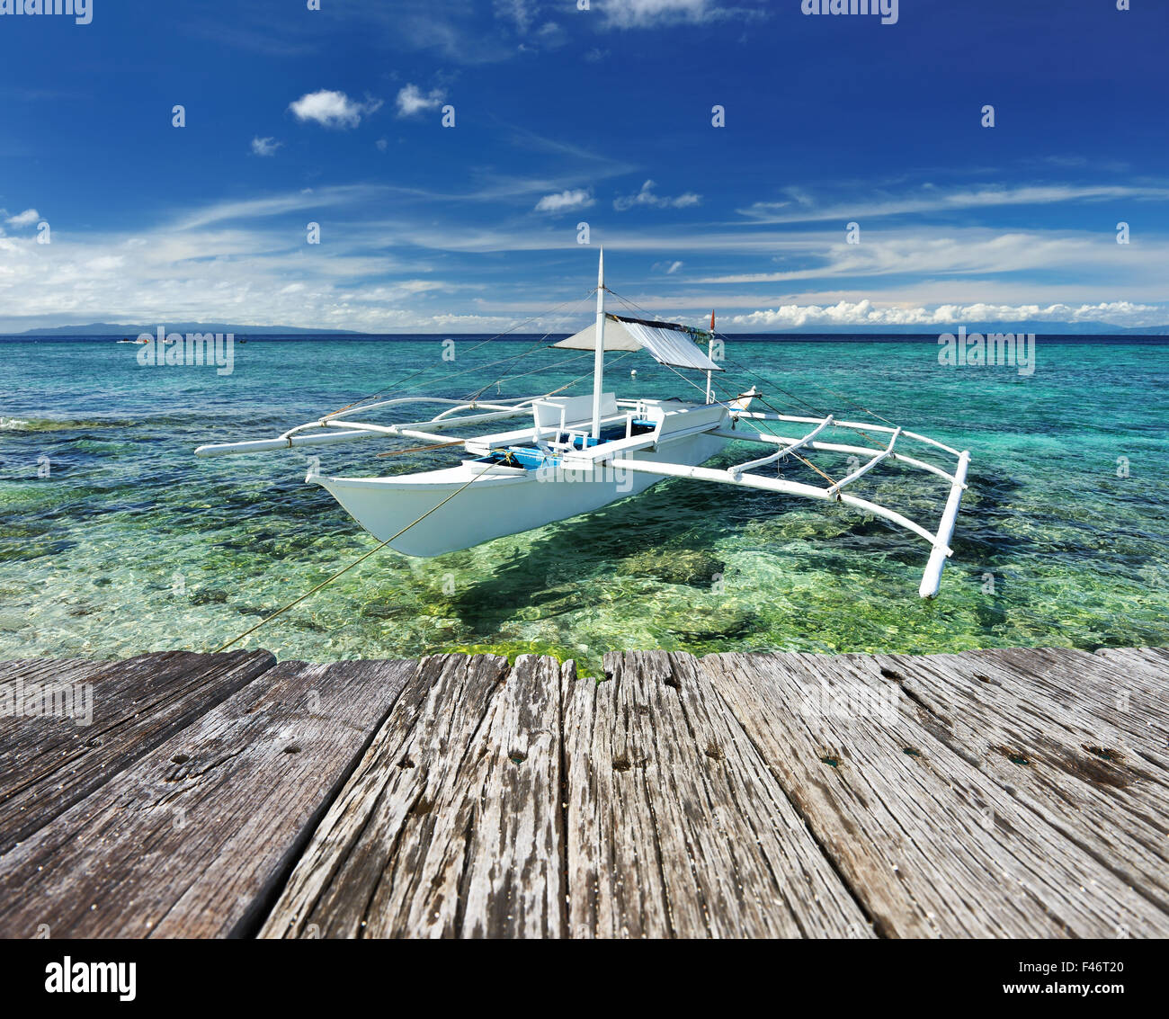 Beautiful beach with boat Stock Photo - Alamy