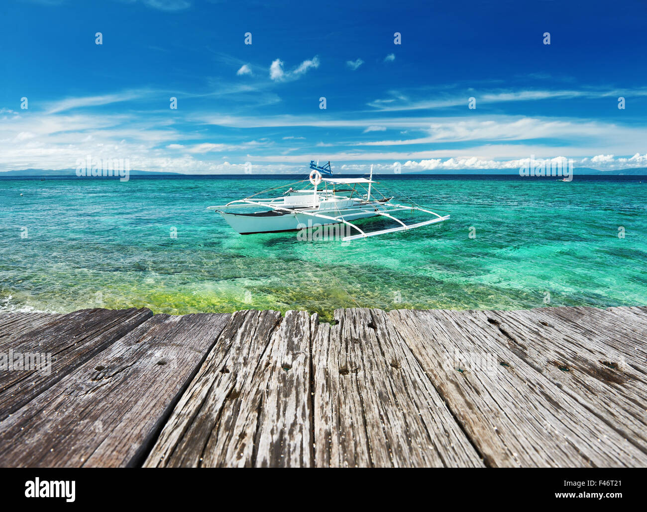 Beautiful beach with boat Stock Photo - Alamy