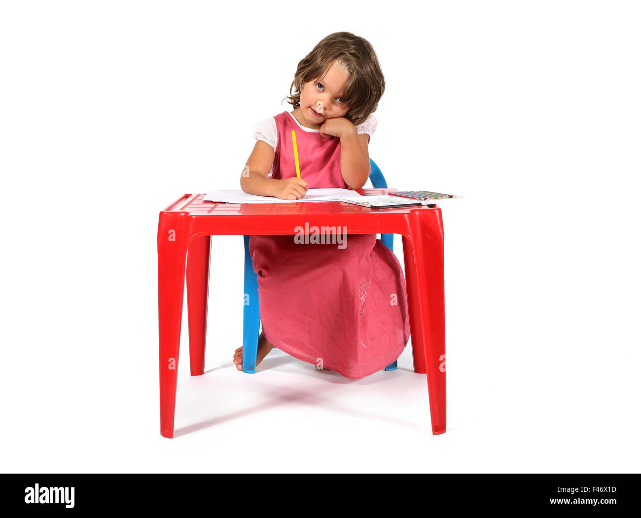 young girl sitted at the desk Stock Photo - Alamy