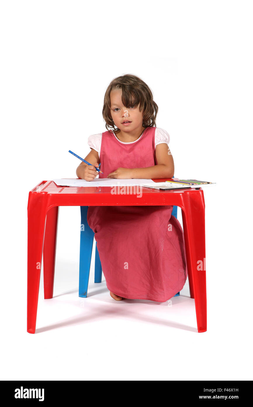 young girl sitted at the desk Stock Photo - Alamy