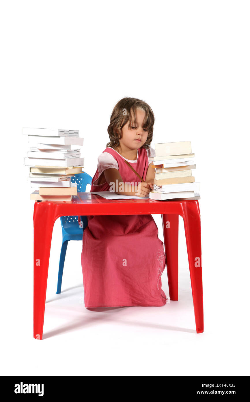 young girl sitted at the desk Stock Photo - Alamy