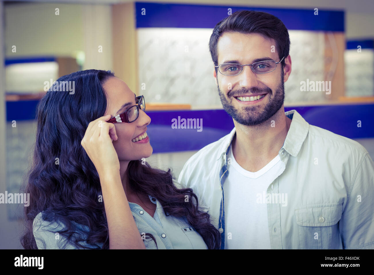 Two customers choosing glasses Stock Photo - Alamy Two customers choosing glasses Stock Photo - Alamy