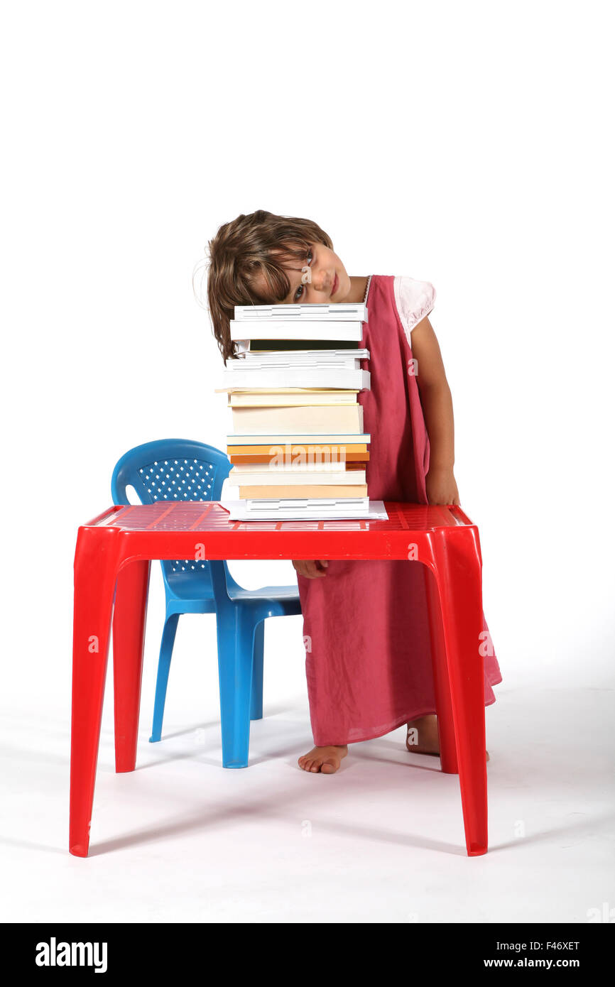 young girl sitted at the desk Stock Photo - Alamy