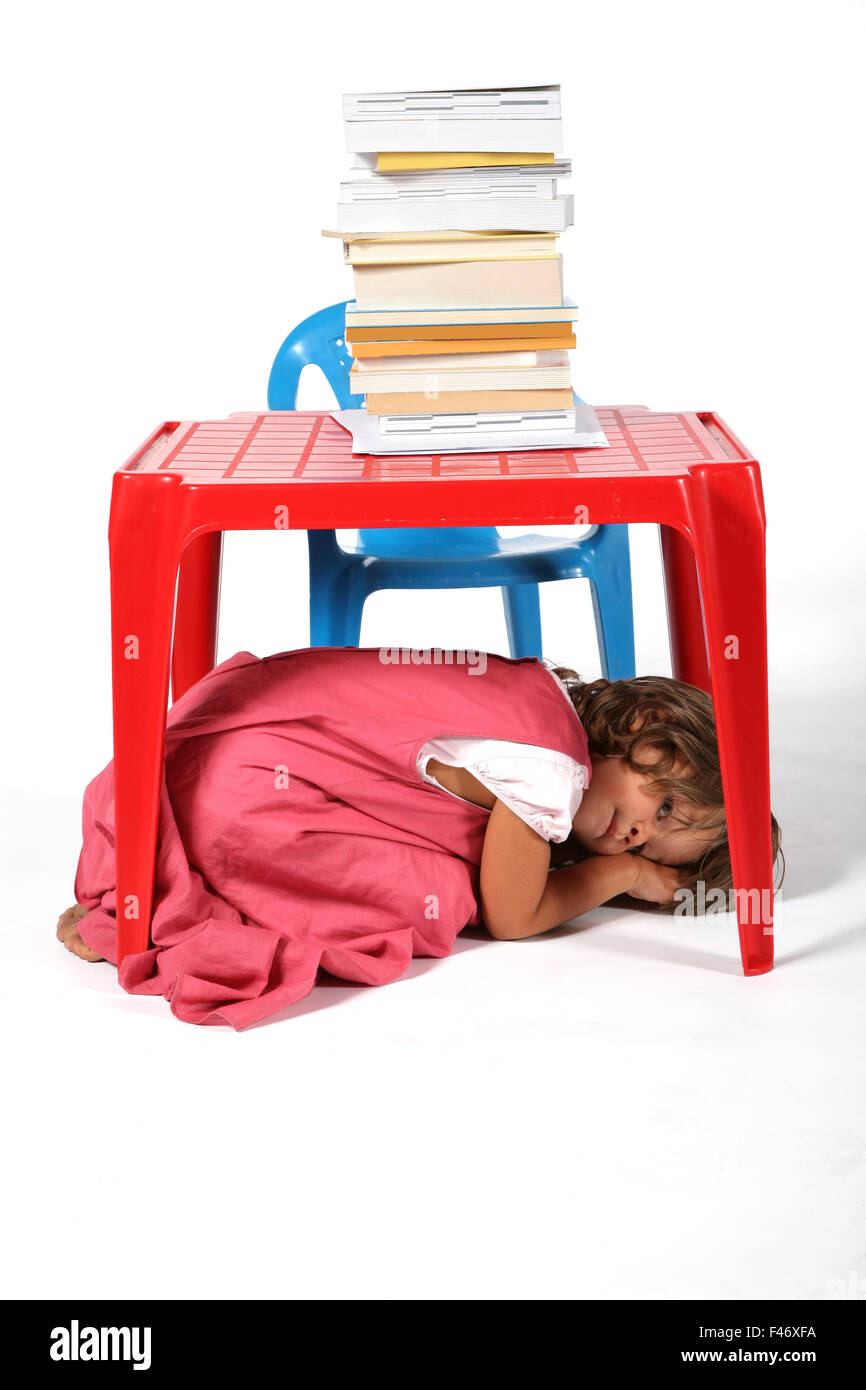 young girl sitted at the desk Stock Photo - Alamy