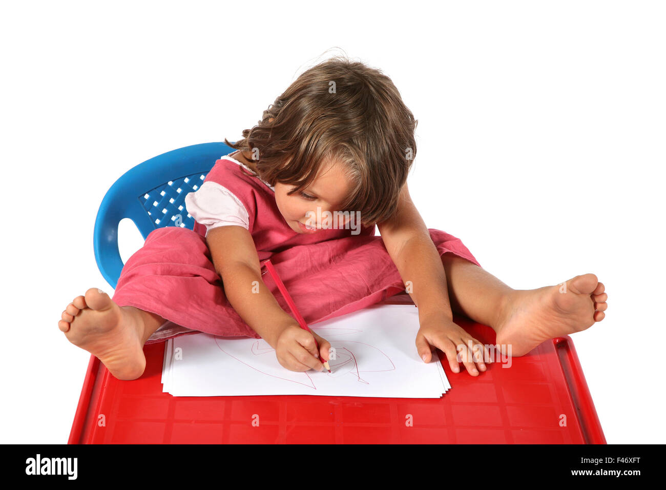 young girl sitted at the desk Stock Photo - Alamy