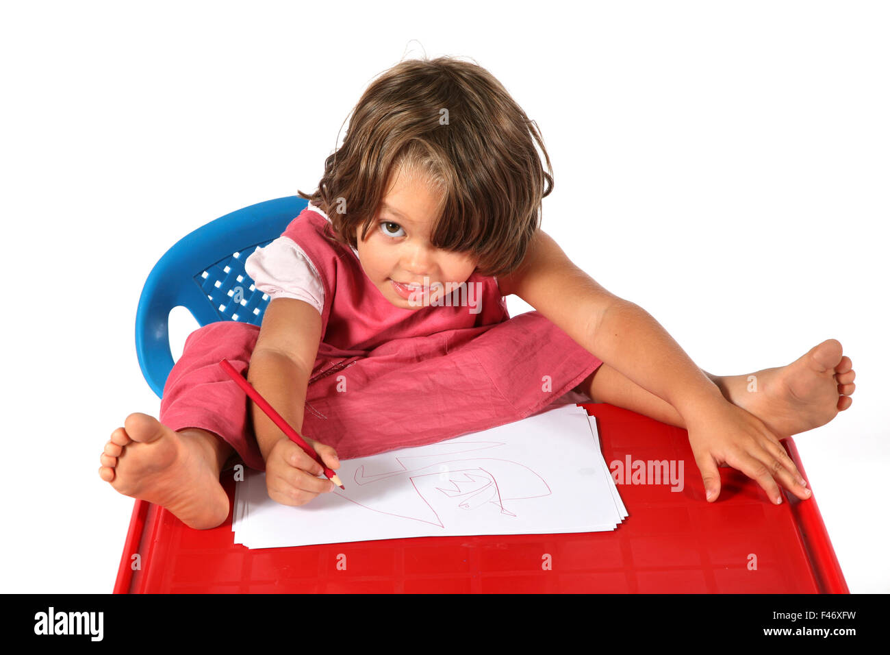 young girl sitted at the desk Stock Photo - Alamy