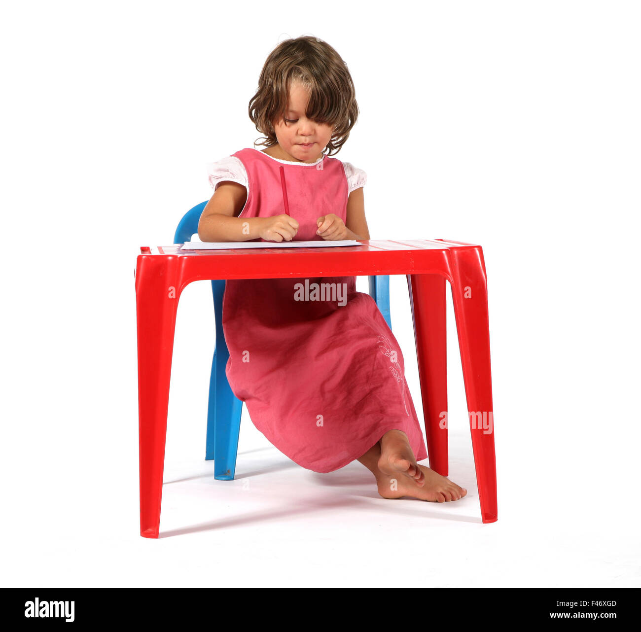 young girl sitted at the desk Stock Photo - Alamy