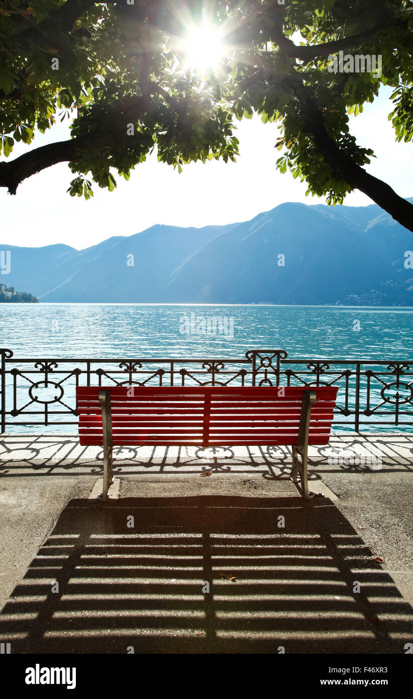 empty bench by the lake Stock Photo - Alamy