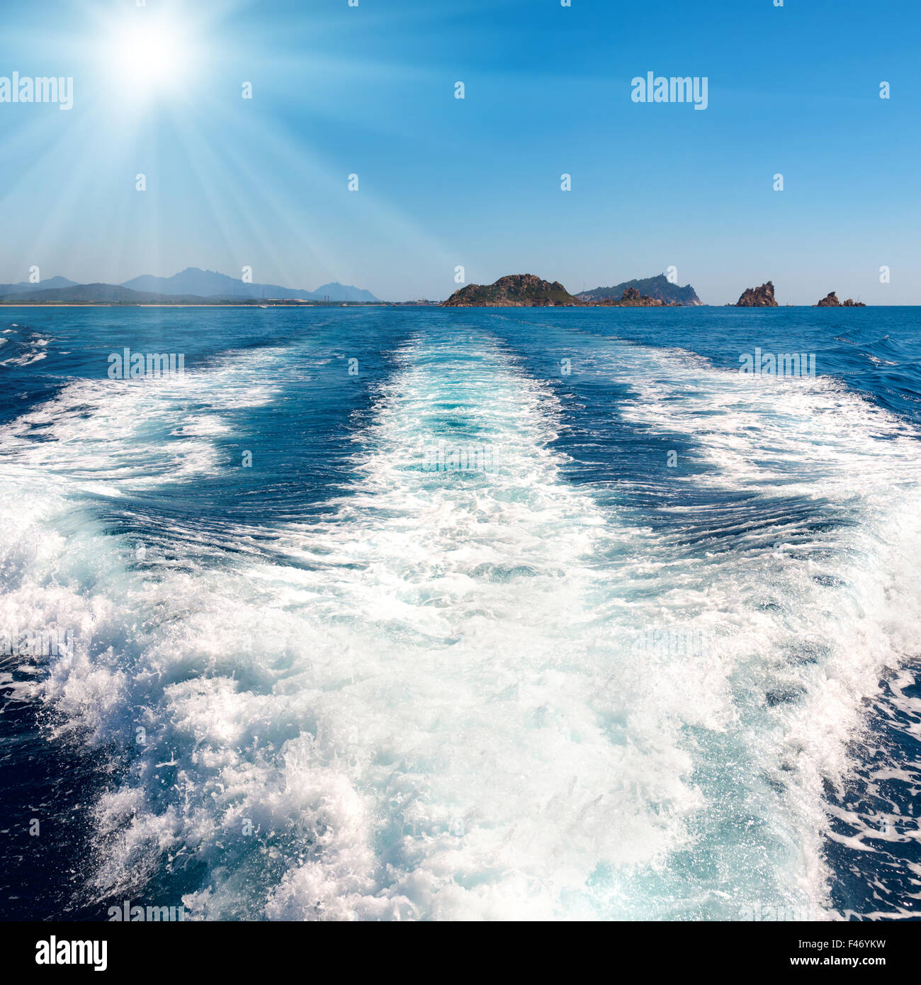Waves on blue sea behind the boat Stock Photo - Alamy