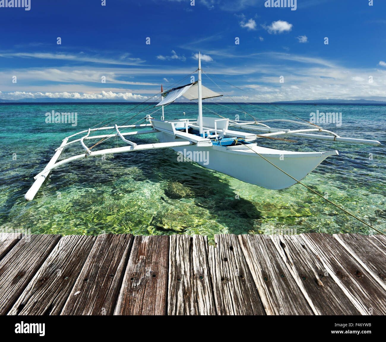 Beautiful beach with boat Stock Photo - Alamy