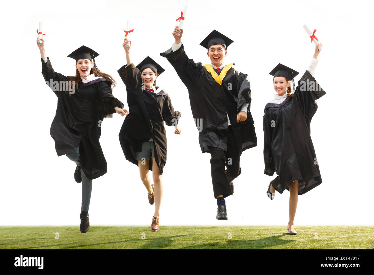 Students in graduation clothing Stock Photo - Alamy