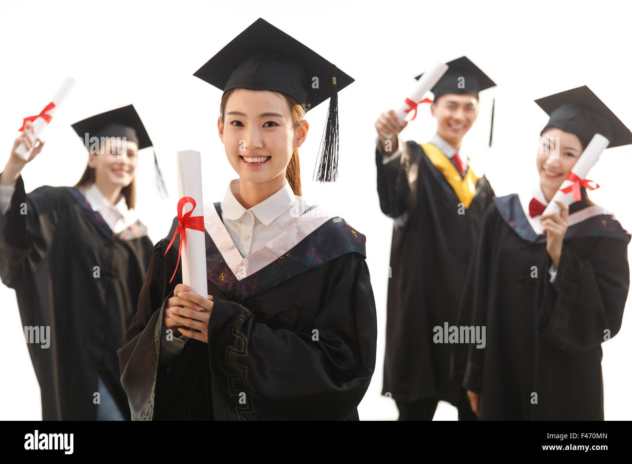 Students in graduation clothing Stock Photo - Alamy