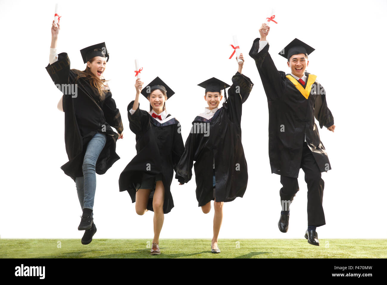 Students in graduation clothing Stock Photo - Alamy