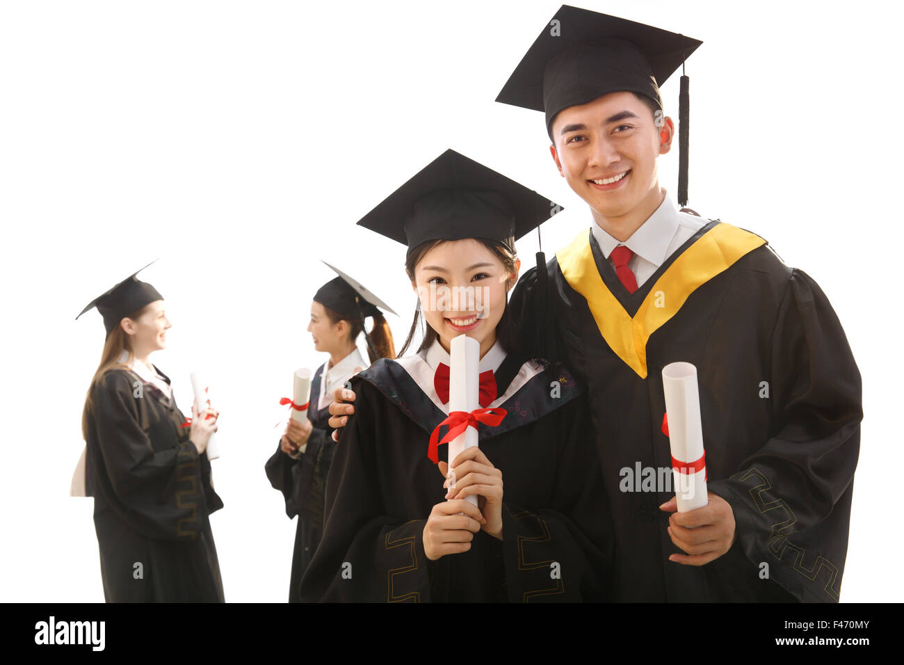 Students in graduation clothing Stock Photo - Alamy