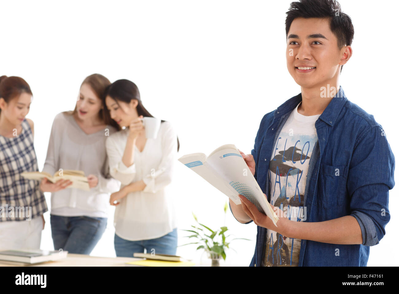 Portrait of young man in classroom Stock Photo - Alamy