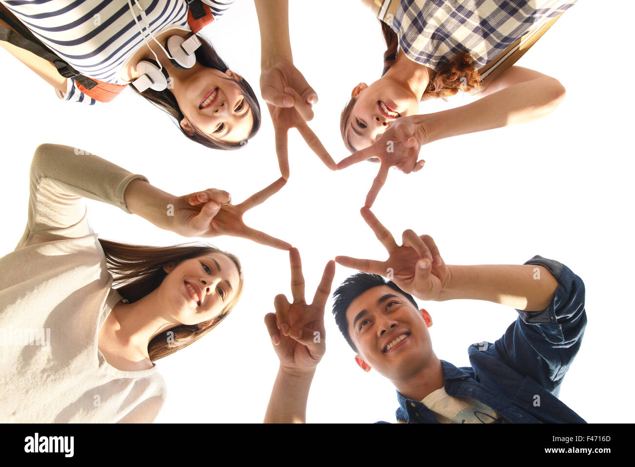 Four hands in circle hi-res stock photography and images - Alamy