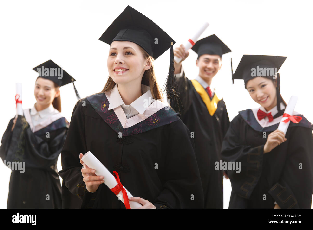 Students in graduation clothing Stock Photo - Alamy