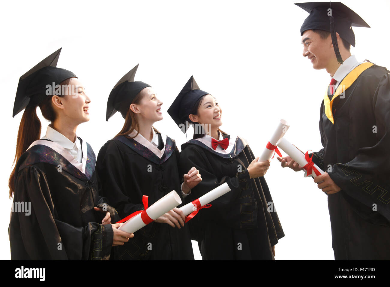 Students in graduation clothing Stock Photo - Alamy